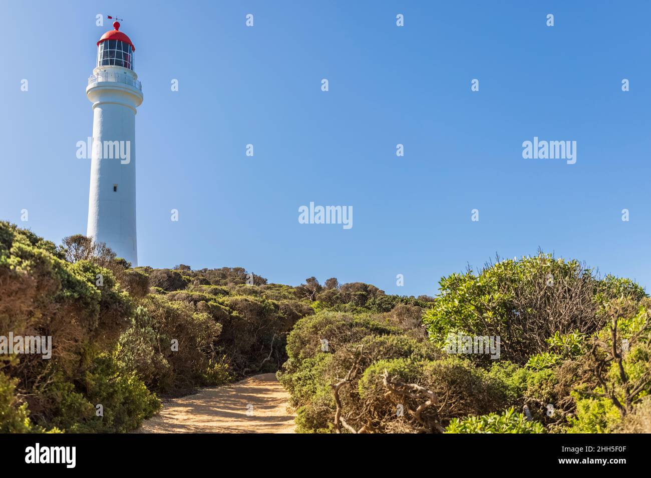 Split Point Lighthouse standing against clear blue sky Stock Photo - Alamy