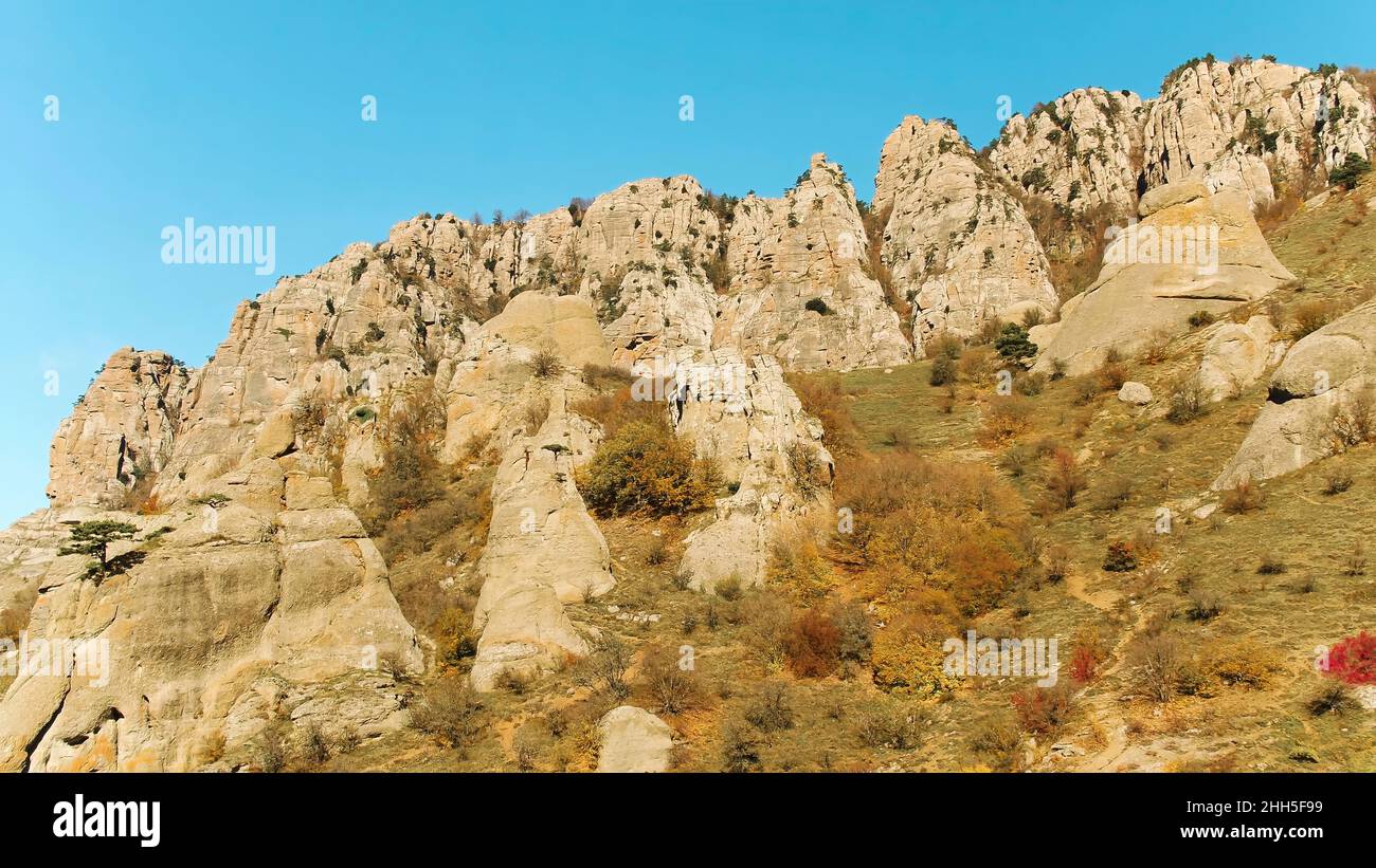 Top view of high mountain range in colorful autumn with green yellow ...