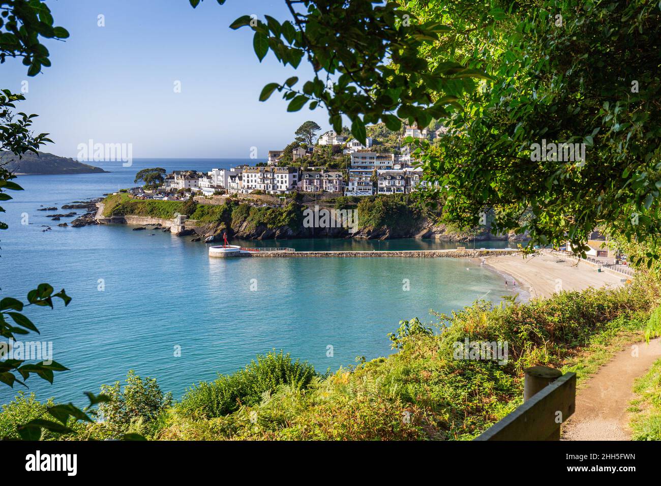 Looe beached Banjo pier in a spring morning with Looe island and ...