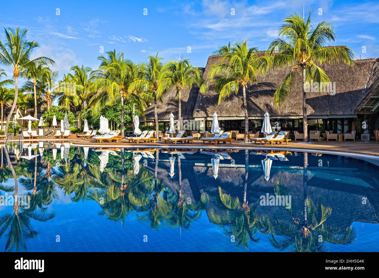 Beach pool in a tropical hotel. Mauritius, The Indian Ocean Stock Photo ...