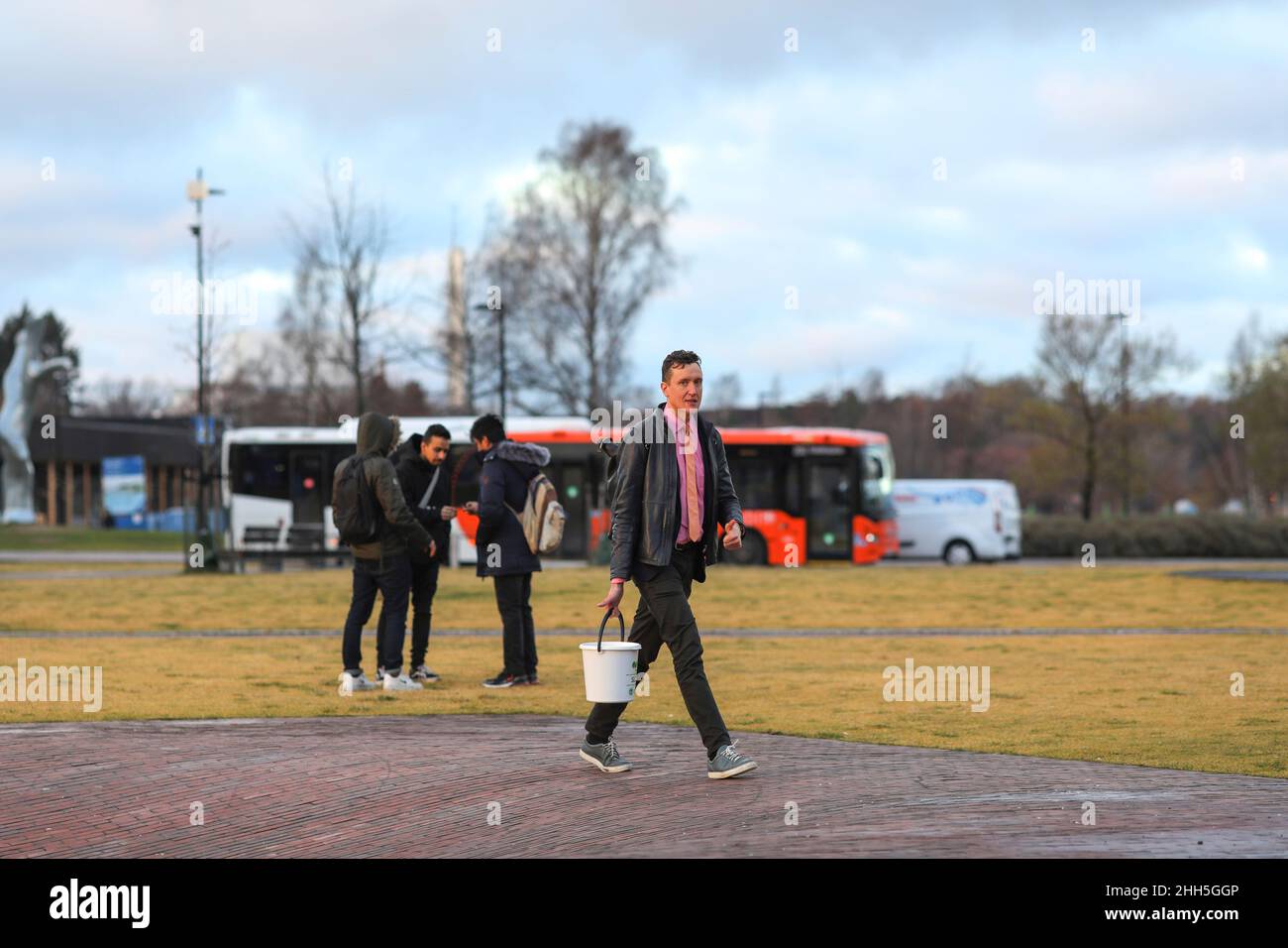 People walking along the Kansalaistori square in HelsinkiIn November ...