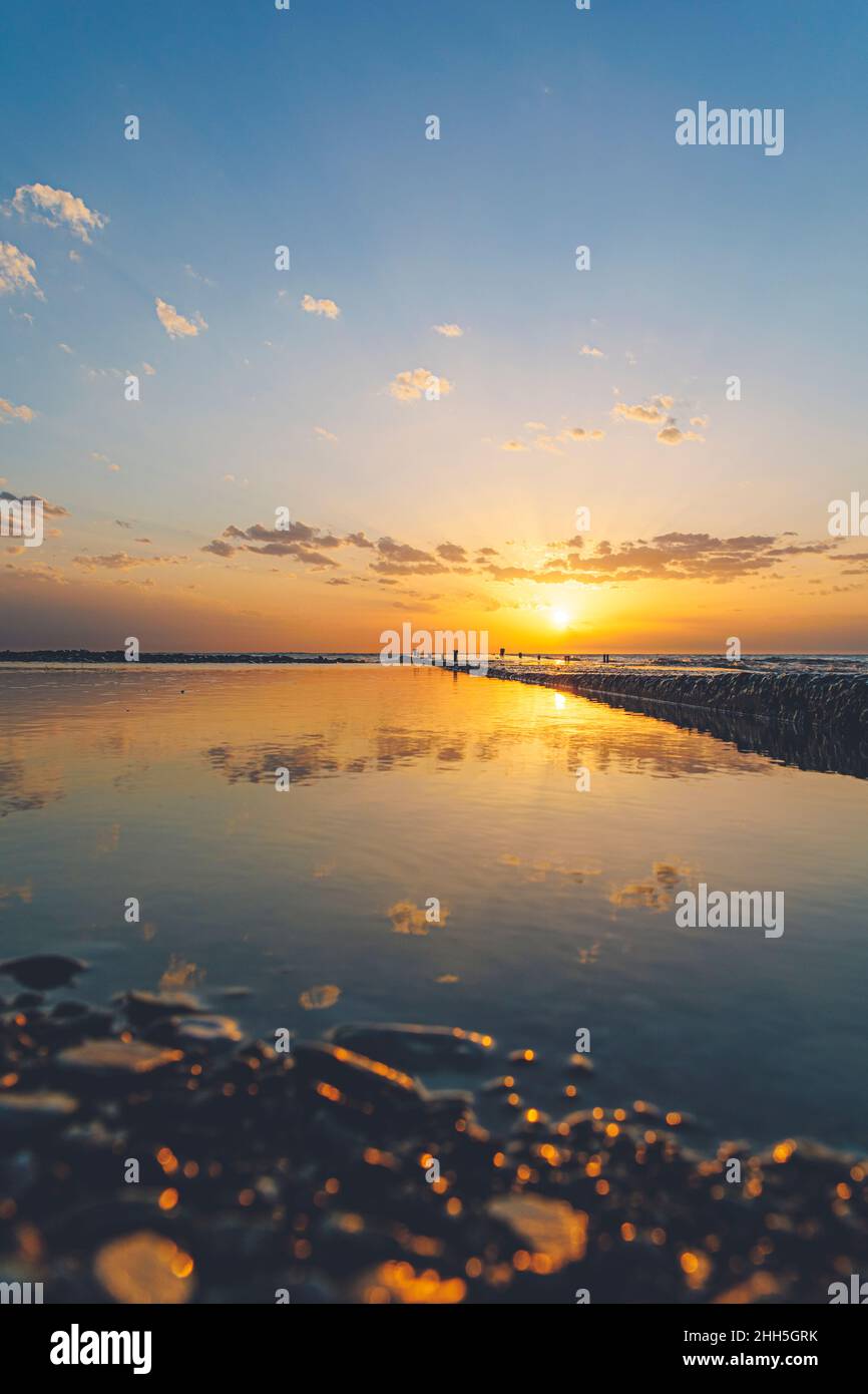 Beautiful Black Sea with clouds reflection at sunset Stock Photo - Alamy