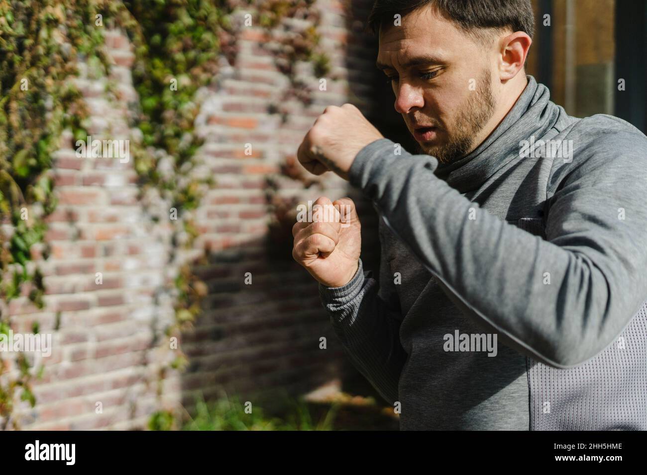 Man punching man hi-res stock photography and images - Alamy