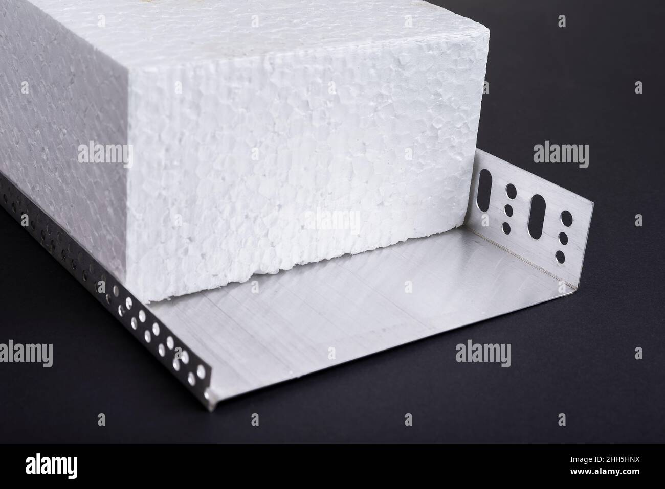 Aluminium base track for a wall insulation Stock Photo - Alamy