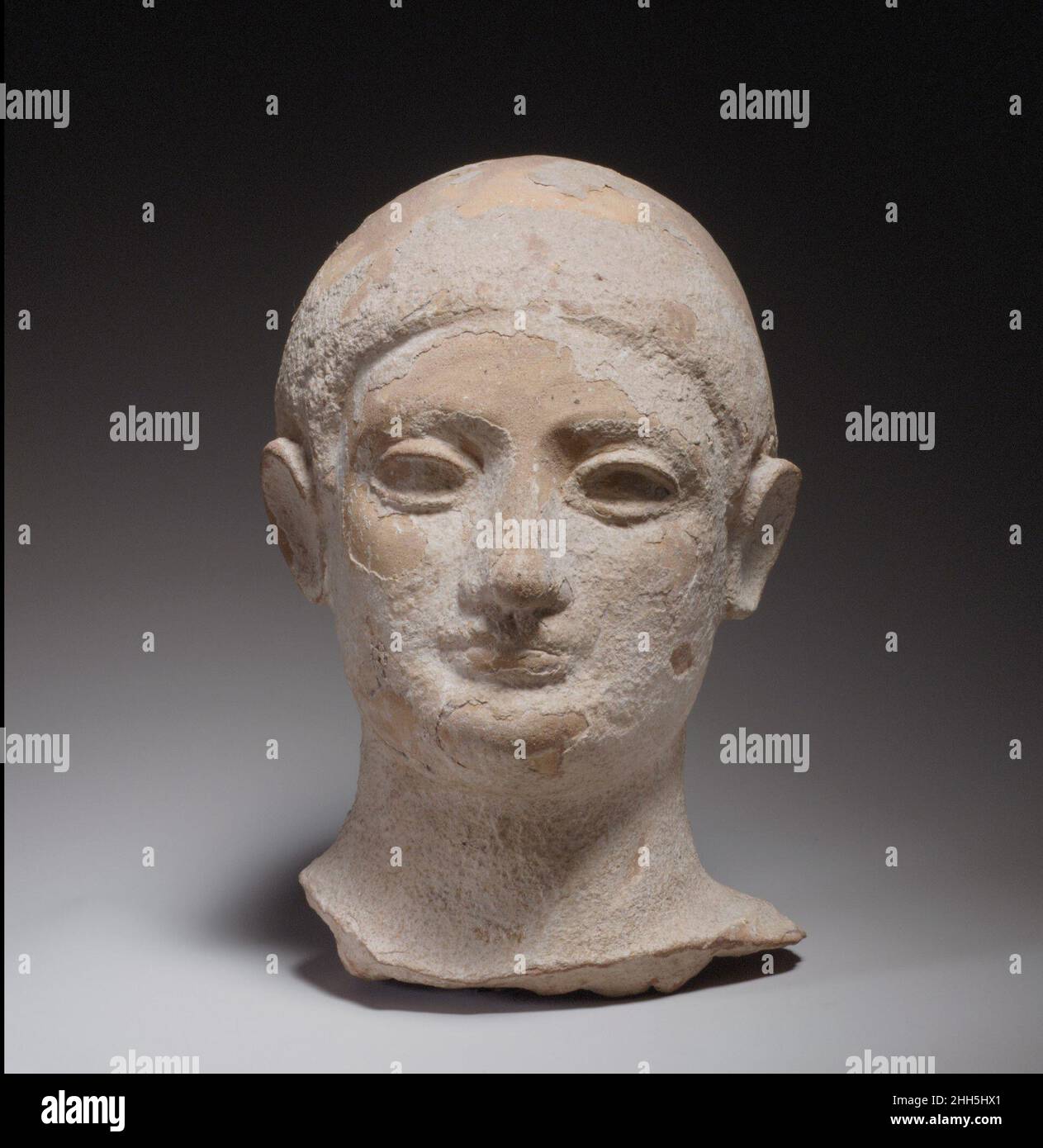 Terracotta head of a youth early 3rd century B.C. (?) Cypriot The head ...