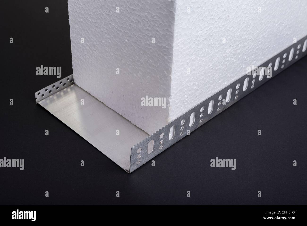 Aluminium base track for a wall insulation Stock Photo - Alamy