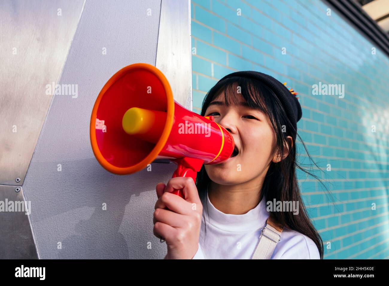Woman megaphone asian hi-res stock photography and images - Alamy