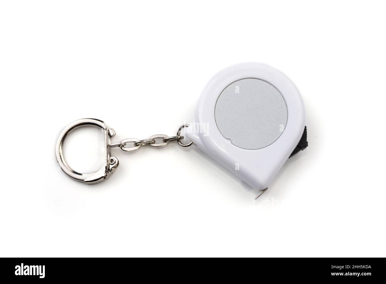 Tape measure keychain on a white background Stock Photo - Alamy