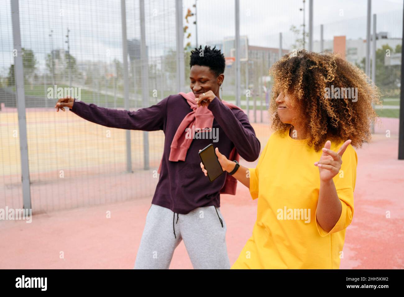 Young man dancing smartphone hi-res stock photography and images - Alamy