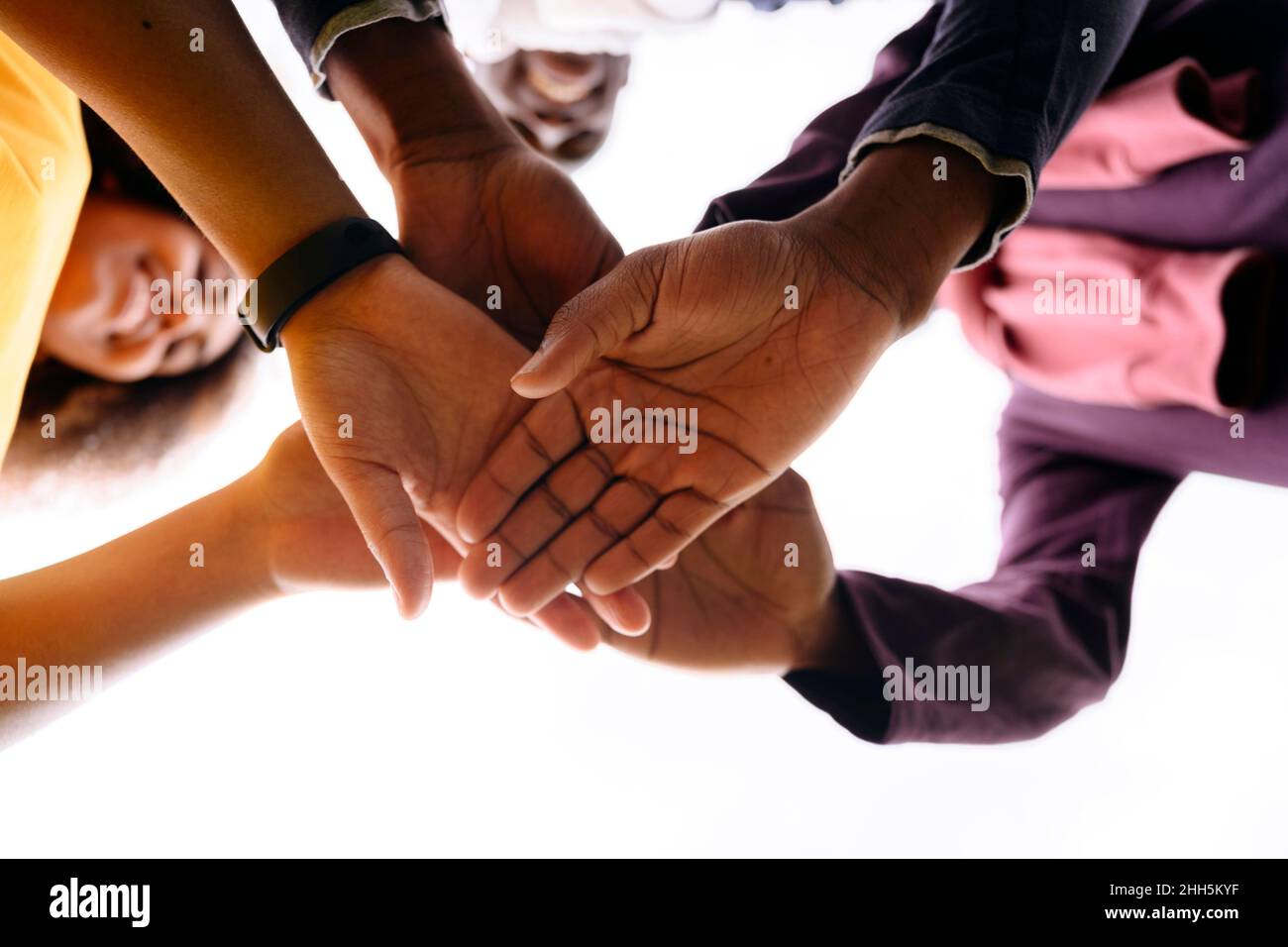 Multiracial hands hi-res stock photography and images - Alamy
