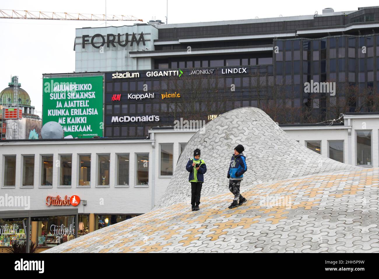 October 29, 2021, Helsinki, Uusimaa, Finland: Kids stand on the roof of ...
