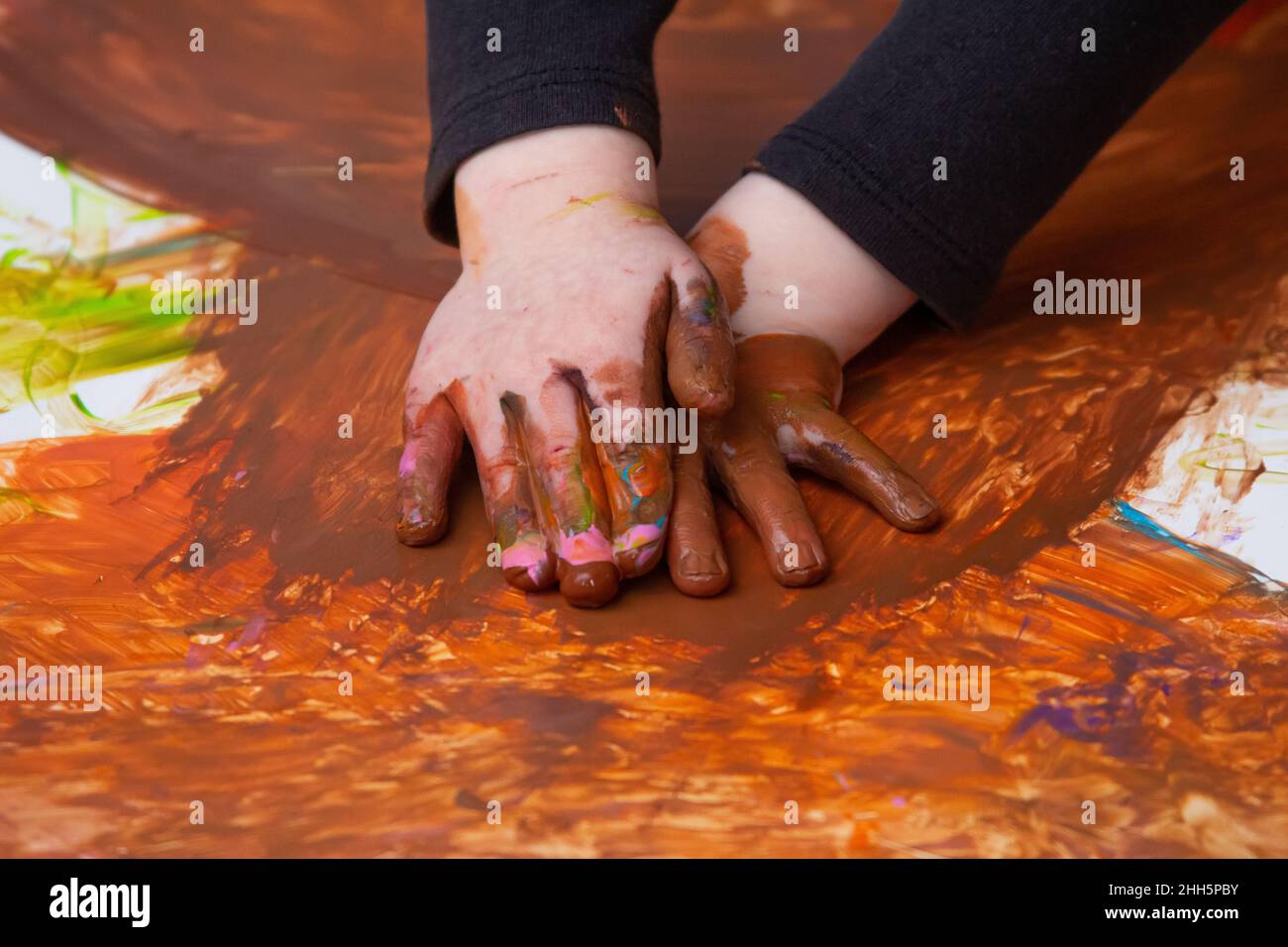finger painting with messy hands isolated Stock Photo - Alamy