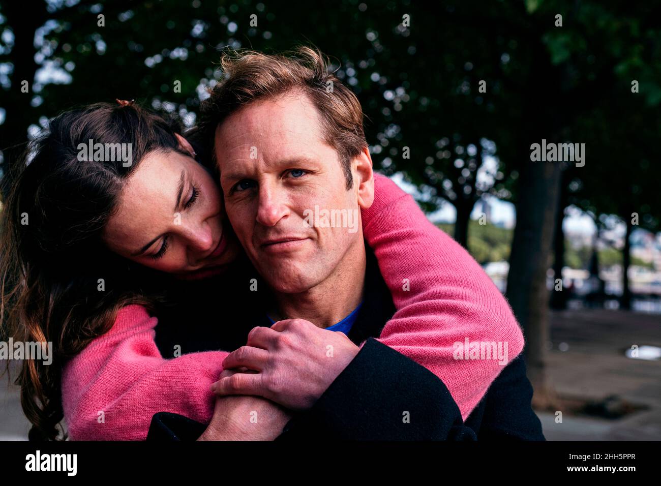 Man and two women from behind hi-res stock photography and images - Alamy