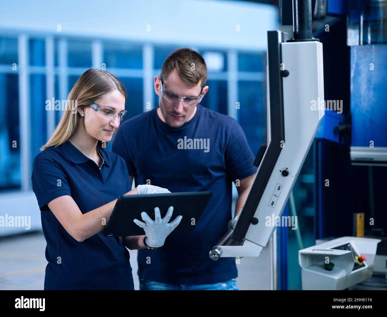 Female technician working on tablet hi-res stock photography and images ...