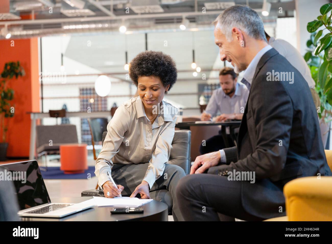 Colleague contract hi-res stock photography and images - Alamy