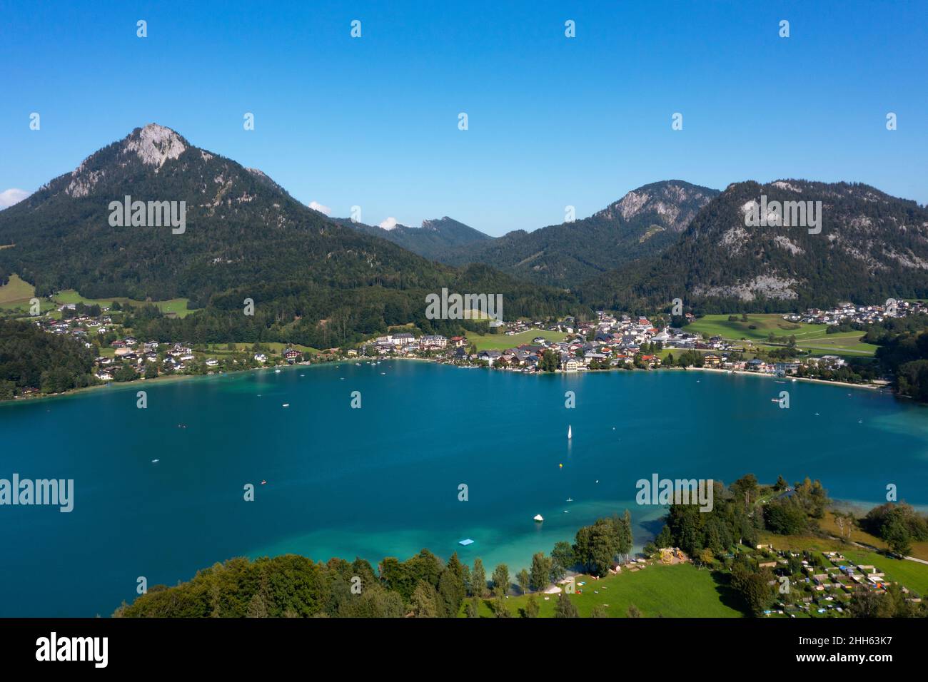 Austria, Salzburg, Fuschl am See, Drone view of mountain village on ...