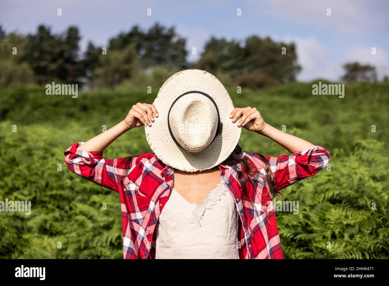 Girl Hiding Face With Hat