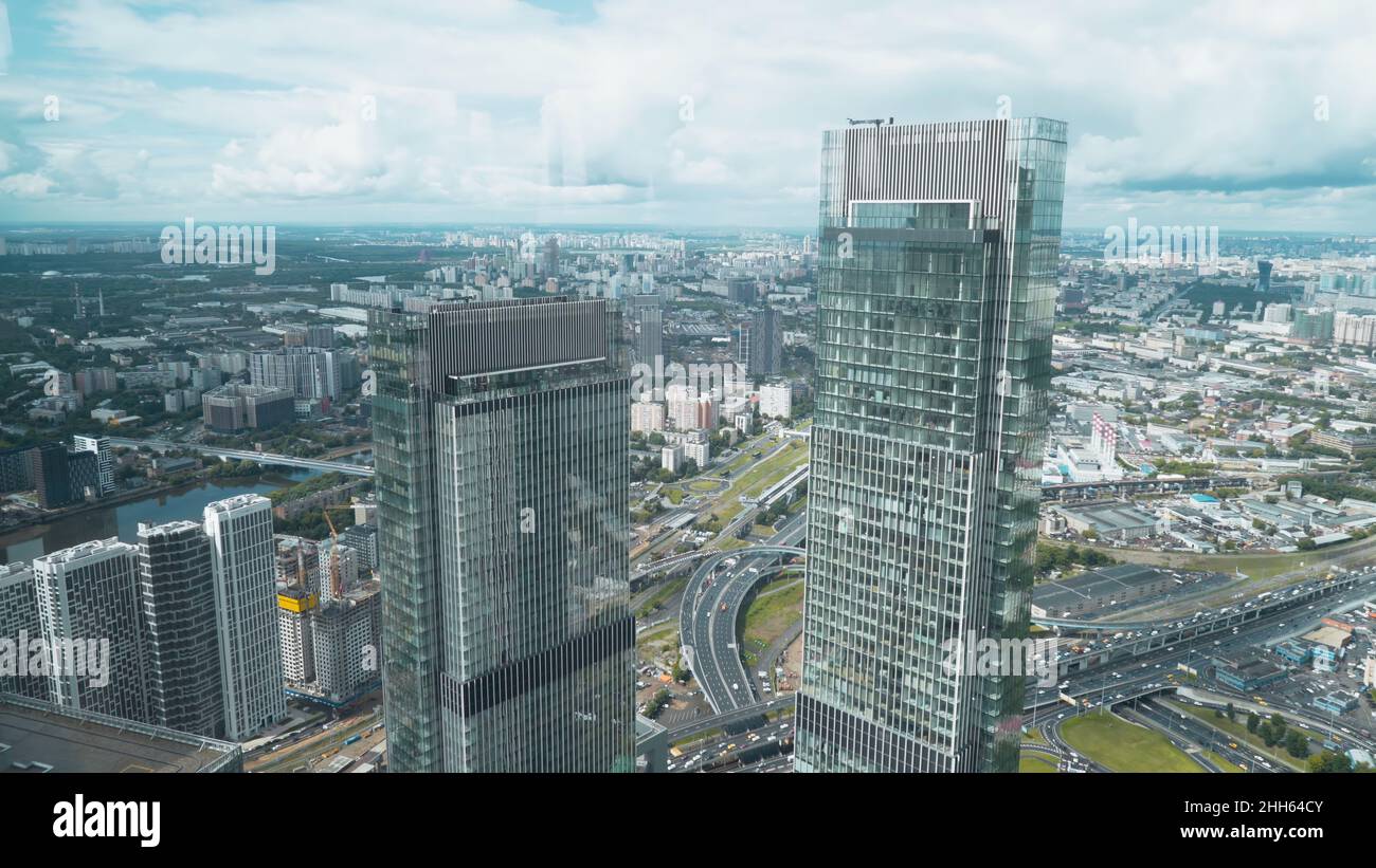 Panoramic view from window of business center of city and cloudy sky ...