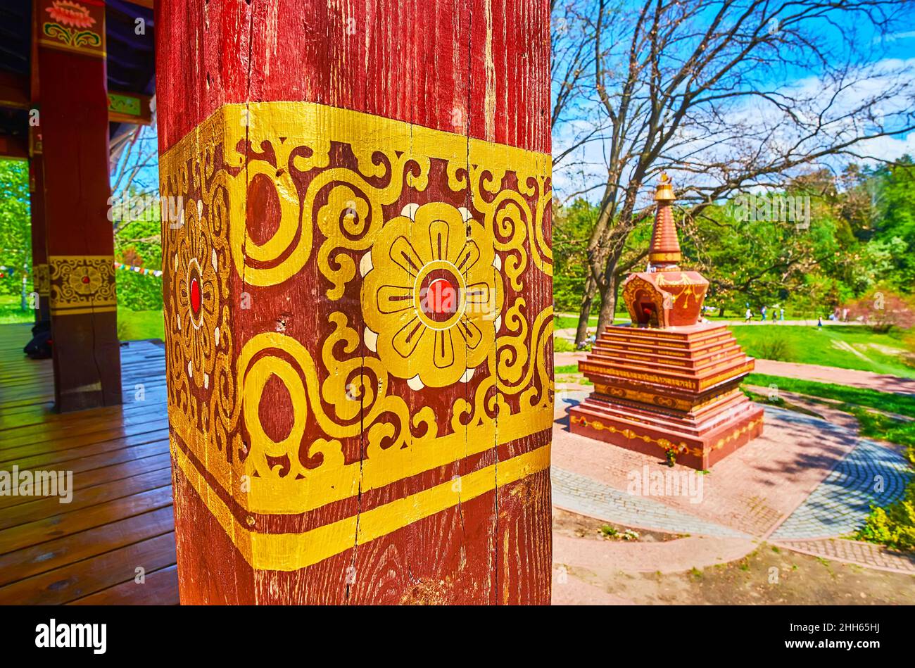 Closeup of the wooden pillar of the meditation pavilion, decorated with ...