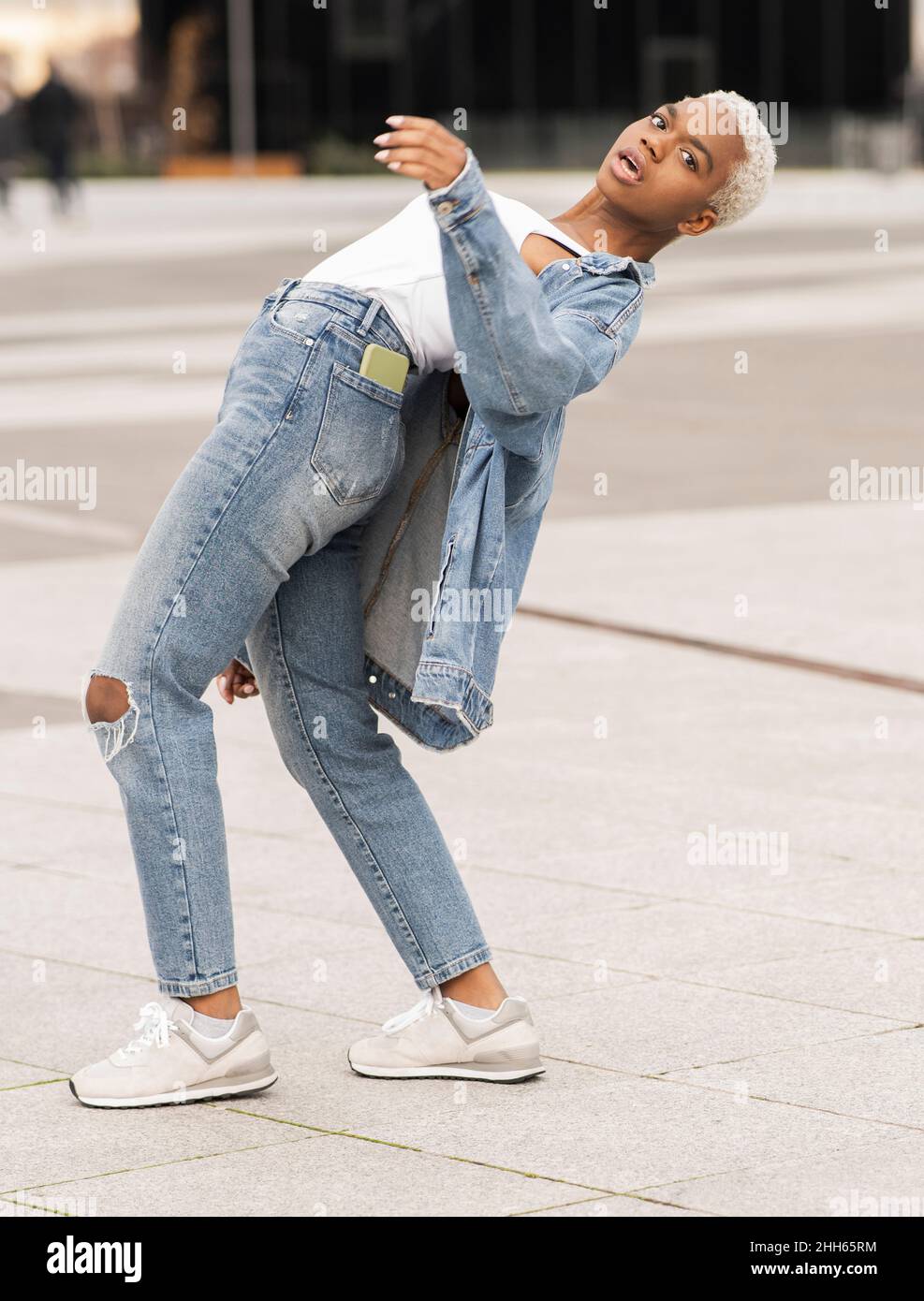 Woman in jeans bending over hi-res stock photography and images - Alamy