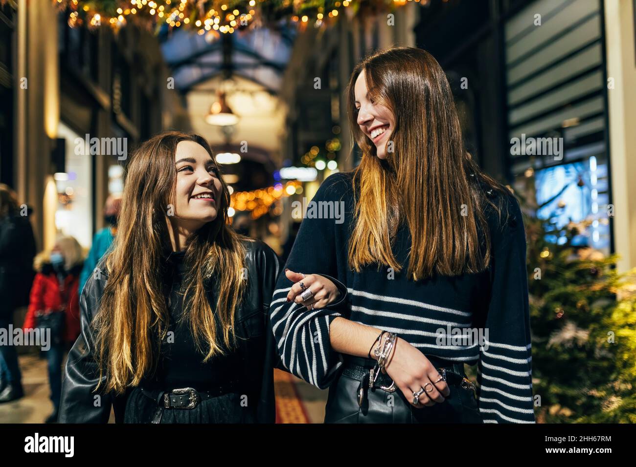 Friends Walking Together At Night