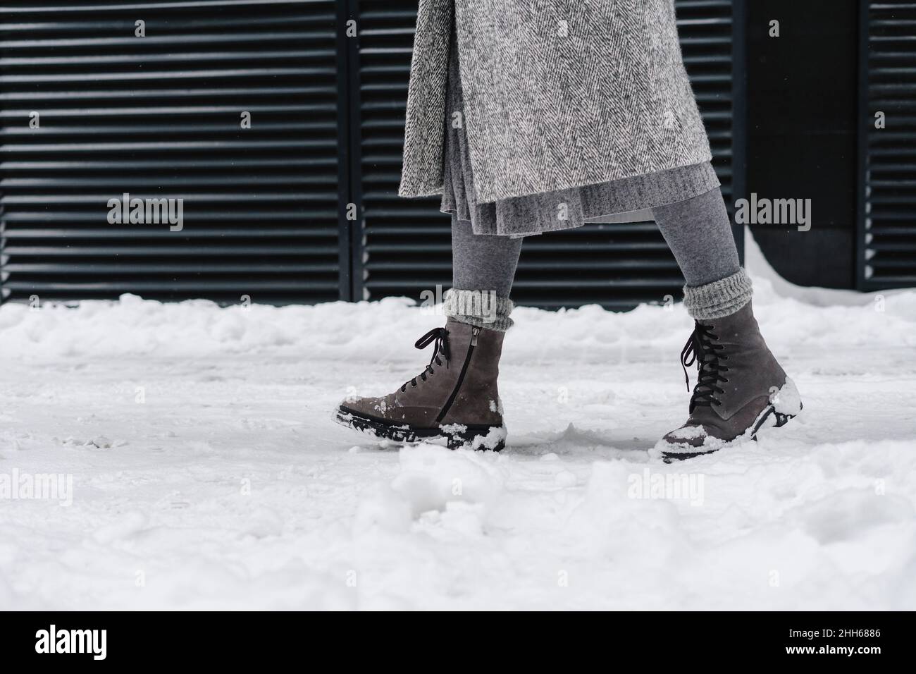Woman wearing white boots hi-res stock photography and images - Alamy