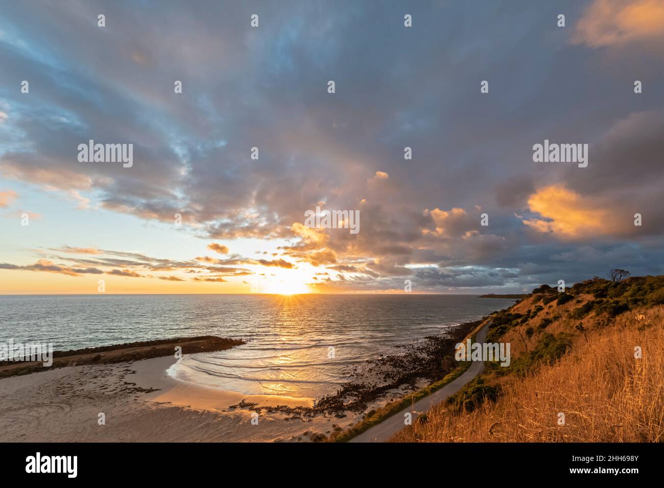 Australia, Victoria, Portland, Pivot Beach Portland at cloudy sunrise ...