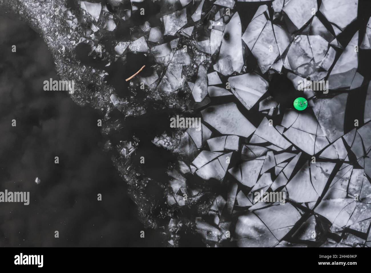 Drone view of ice floating in lake Stock Photo - Alamy