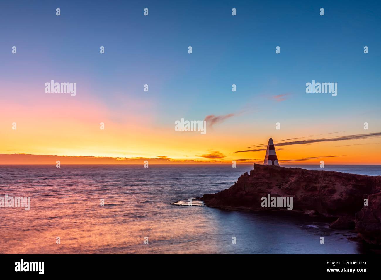 Long exposure cape dombey obelisk moody dusk hi-res stock photography ...