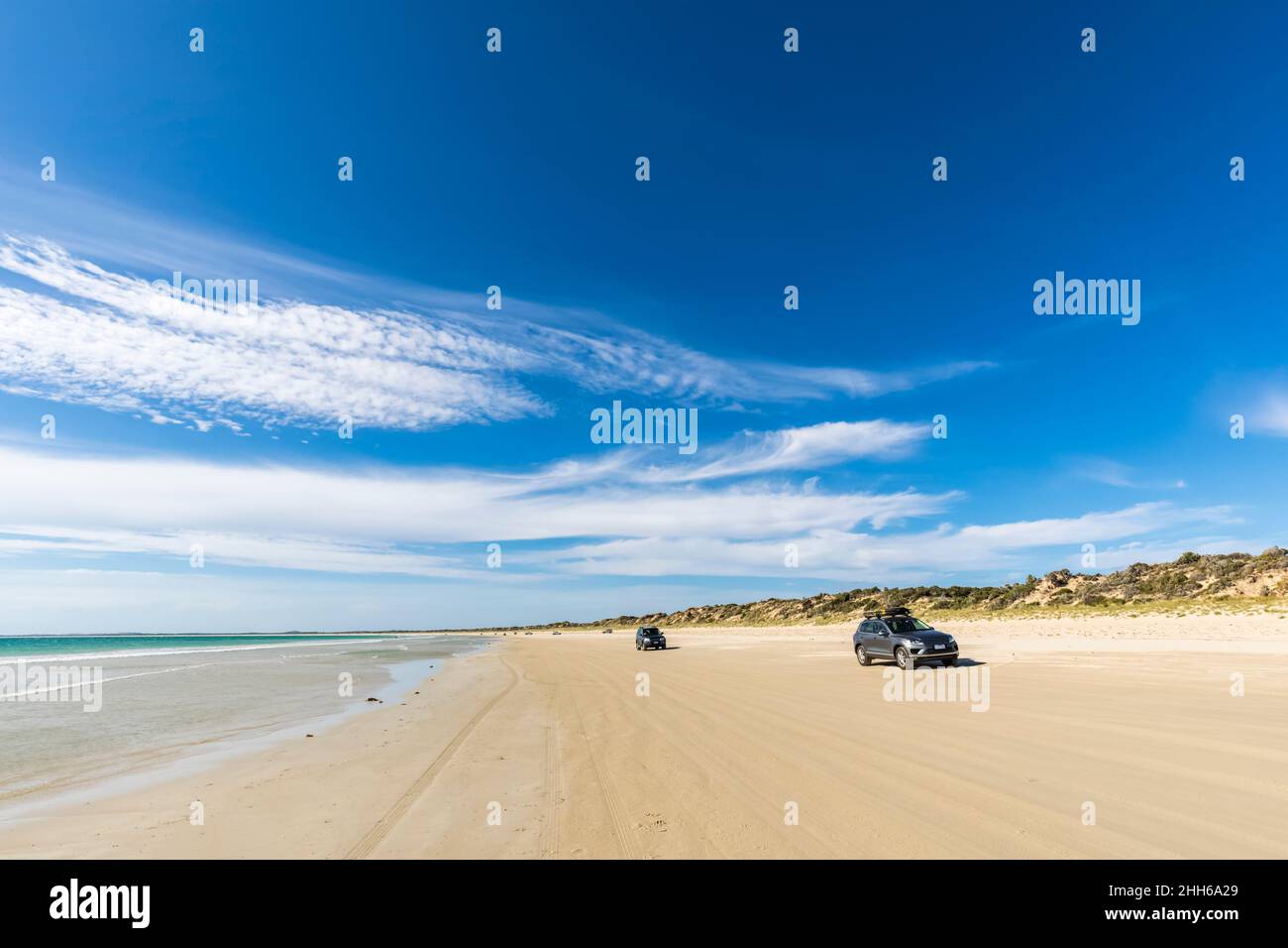 Australia, South Australia, Robe, Car driving along Fox Beach in summer ...