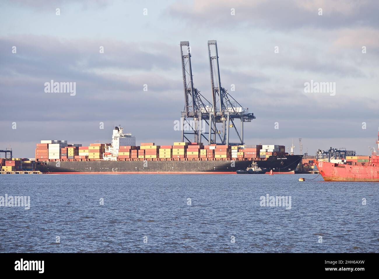 Container ship Zim Haifa preparing to cast off and leave The Port of ...