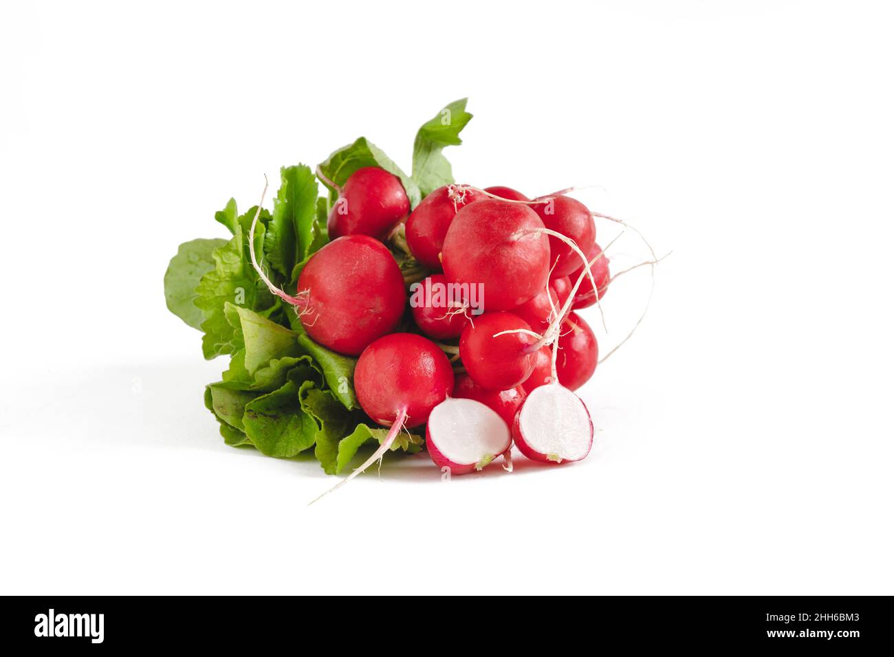 Fresh radish with leaves isolated on white background Stock Photo - Alamy
