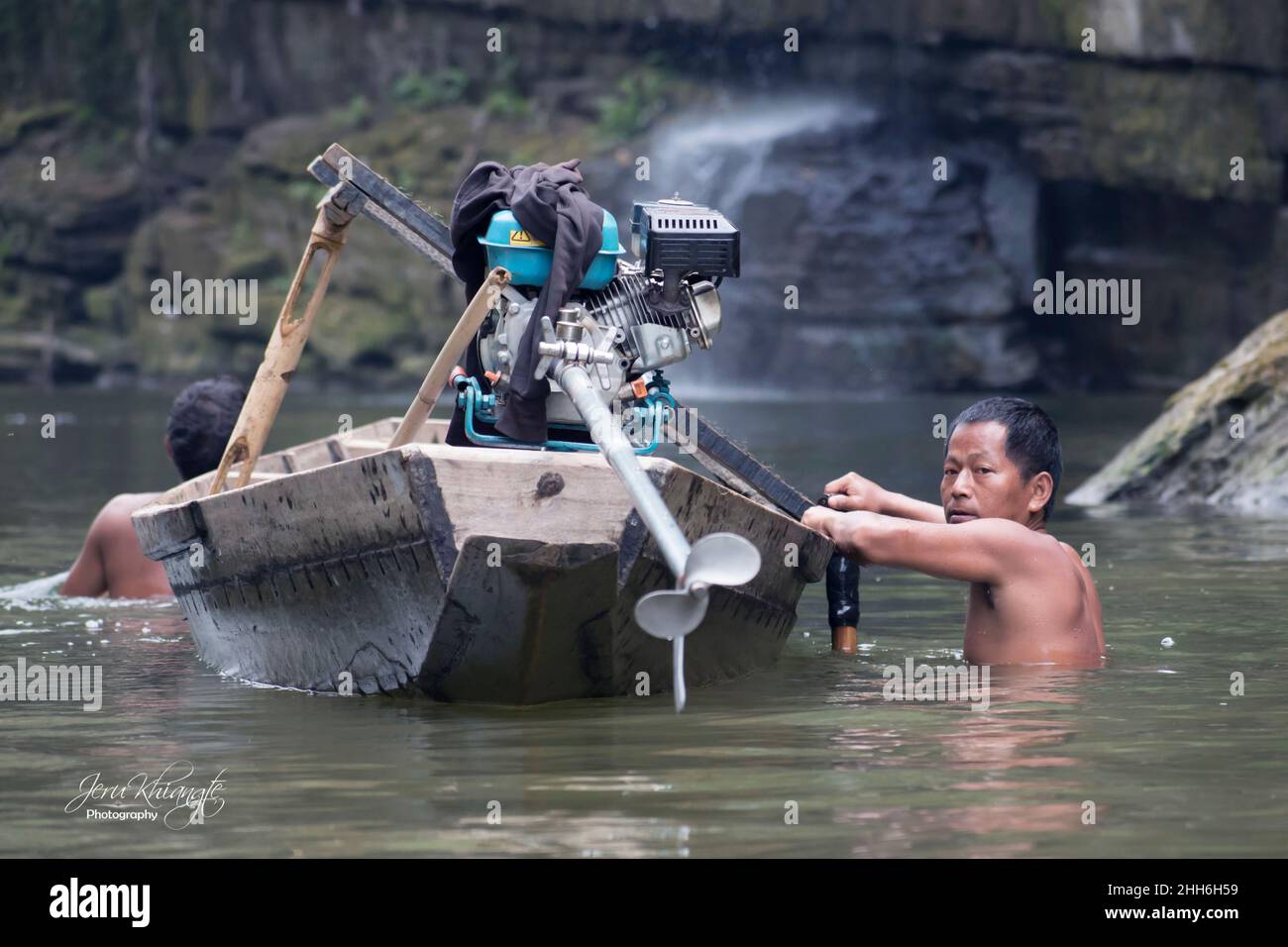 A man pull out sand into the river of Tlawng, Mizoram India Stock Photo ...