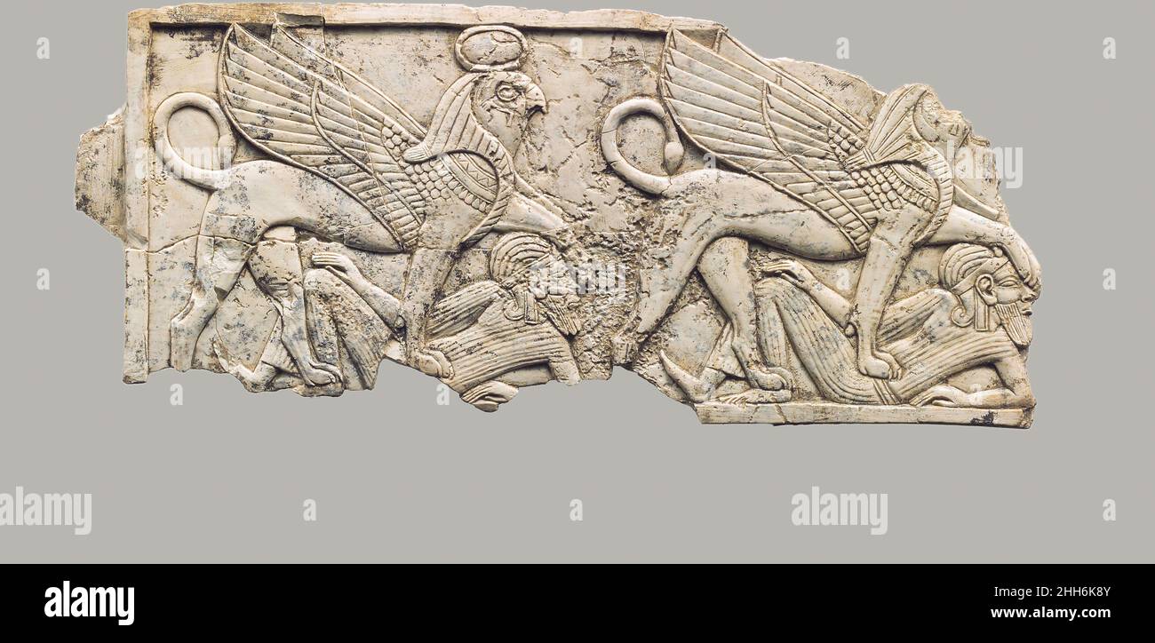 Two falcon headed sphinxes trampling captives hi-res stock photography ...