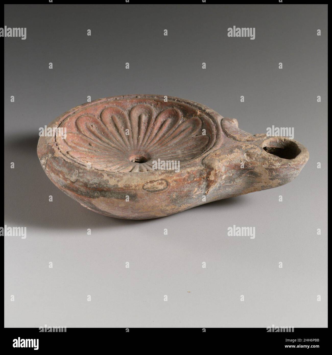 Tarracotta oil lamp ca. A.D. 40–100 Roman Loeschcke Type 4. Mold-made ...
