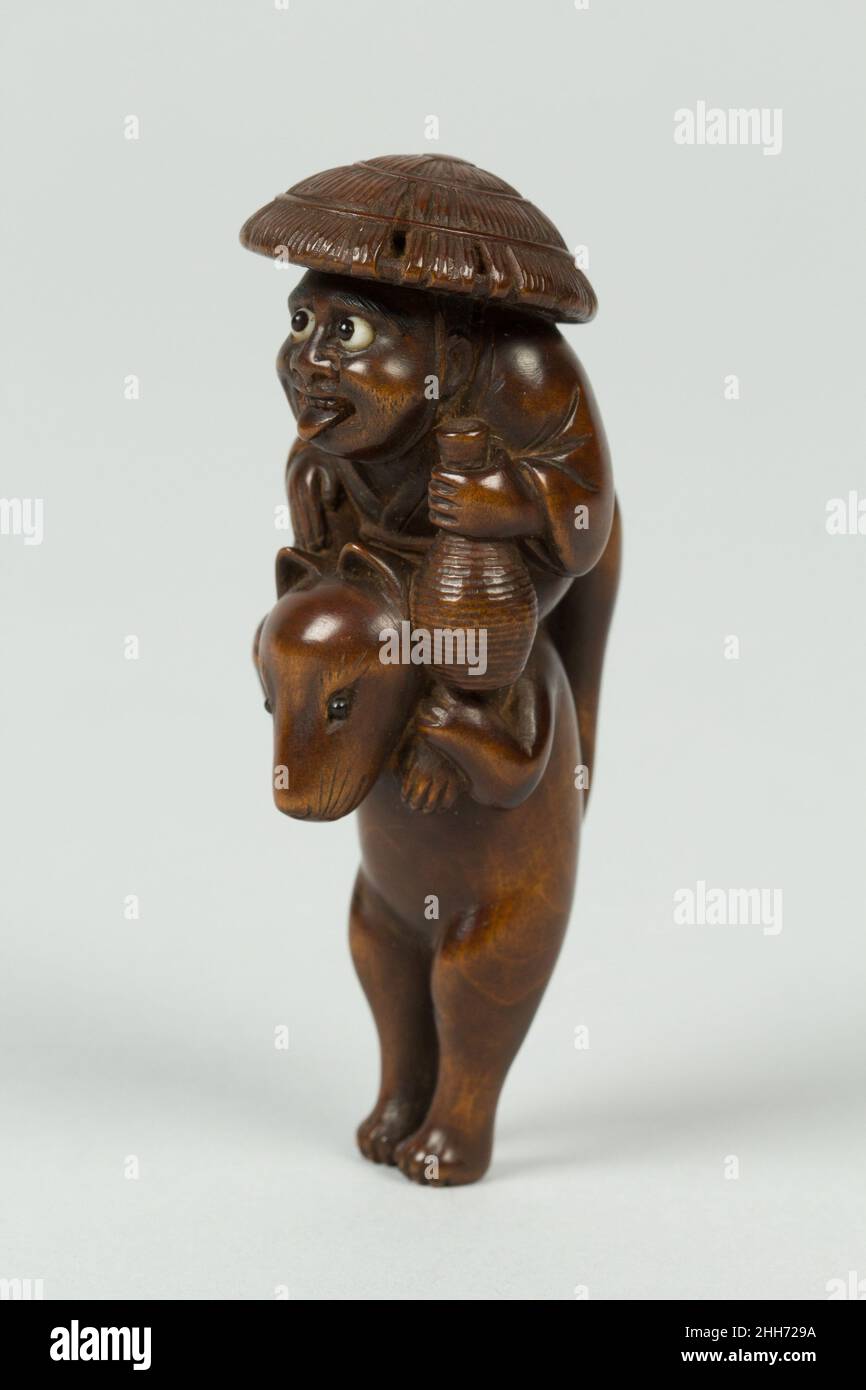 Netsuke of Boy Sitting on the Shoulders of an Animal 18th century Japan ...