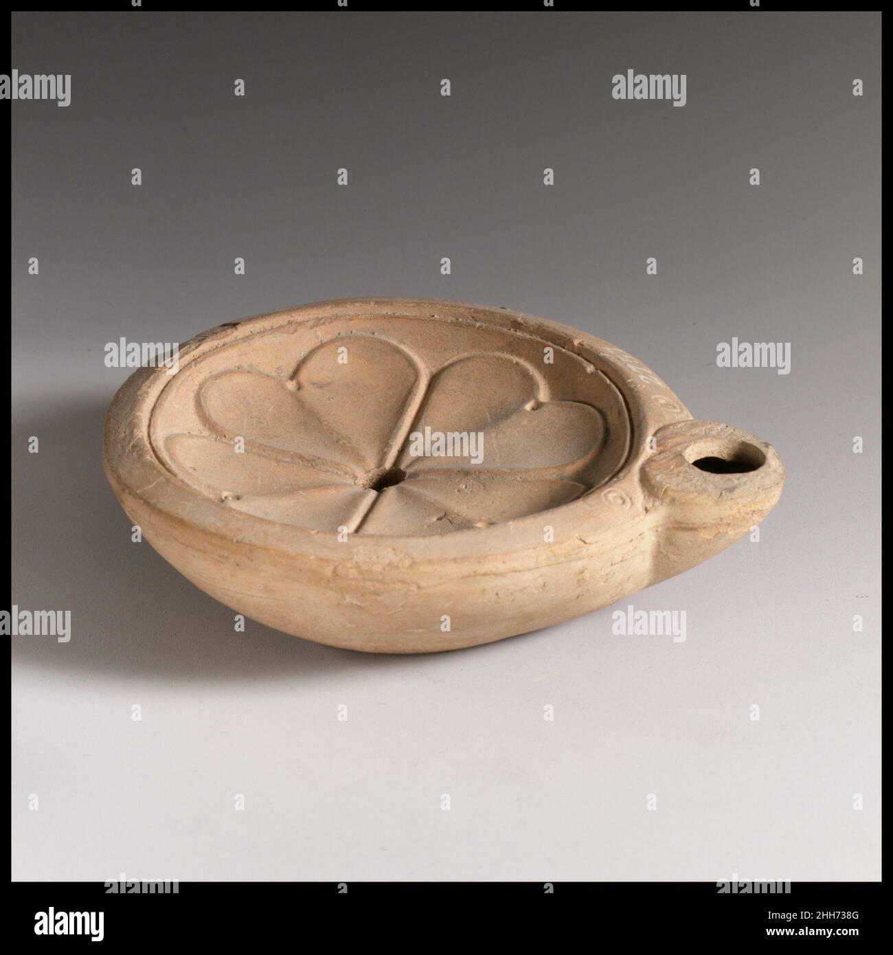Terracotta oil lamp 2nd century A.D. Roman Loeschcke Type 8. Mold-made ...