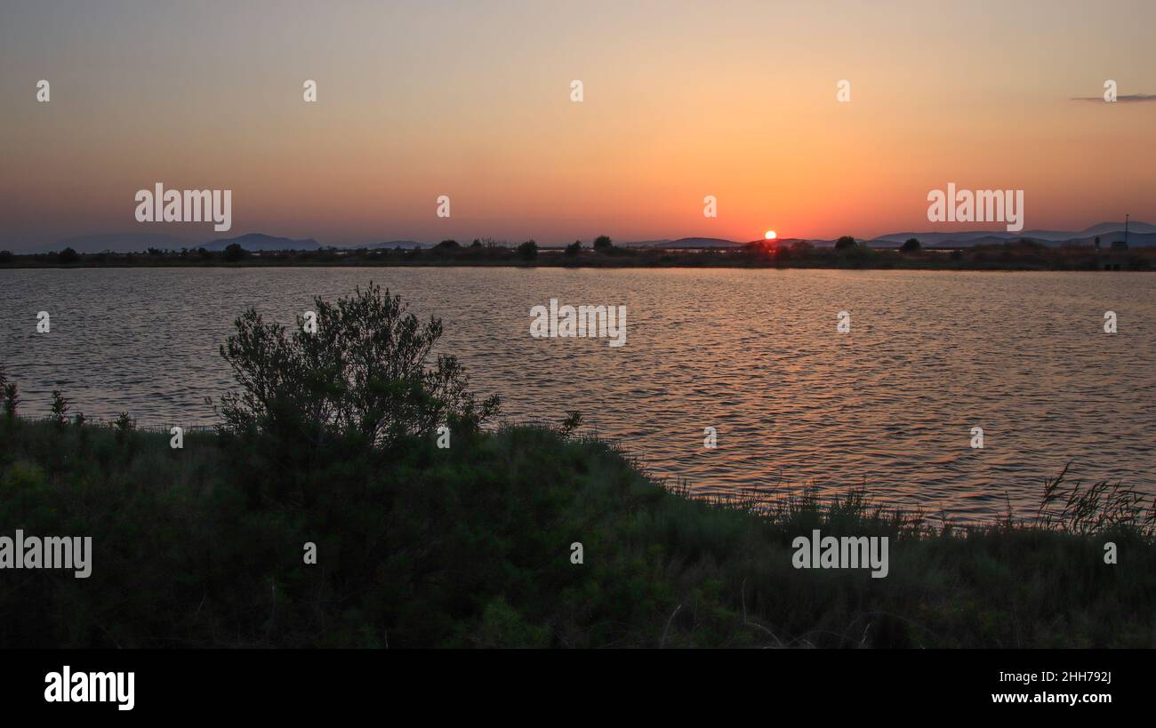 Sunset at the lagoon of Mesologgi,Aitoloakarnania,Greece Stock Photo ...