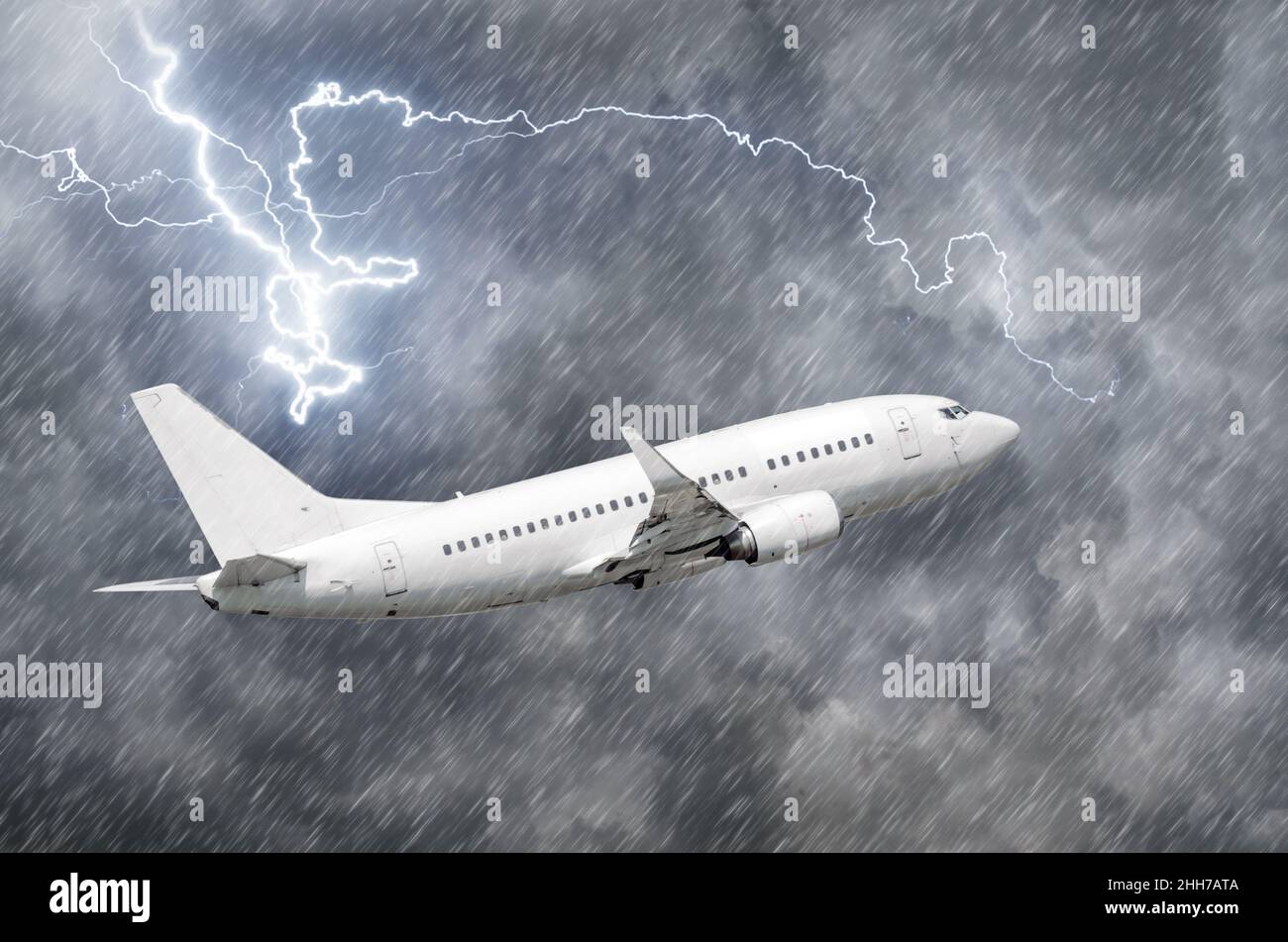 Airplane approach at the airport landing in bad weather storm hurricane ...