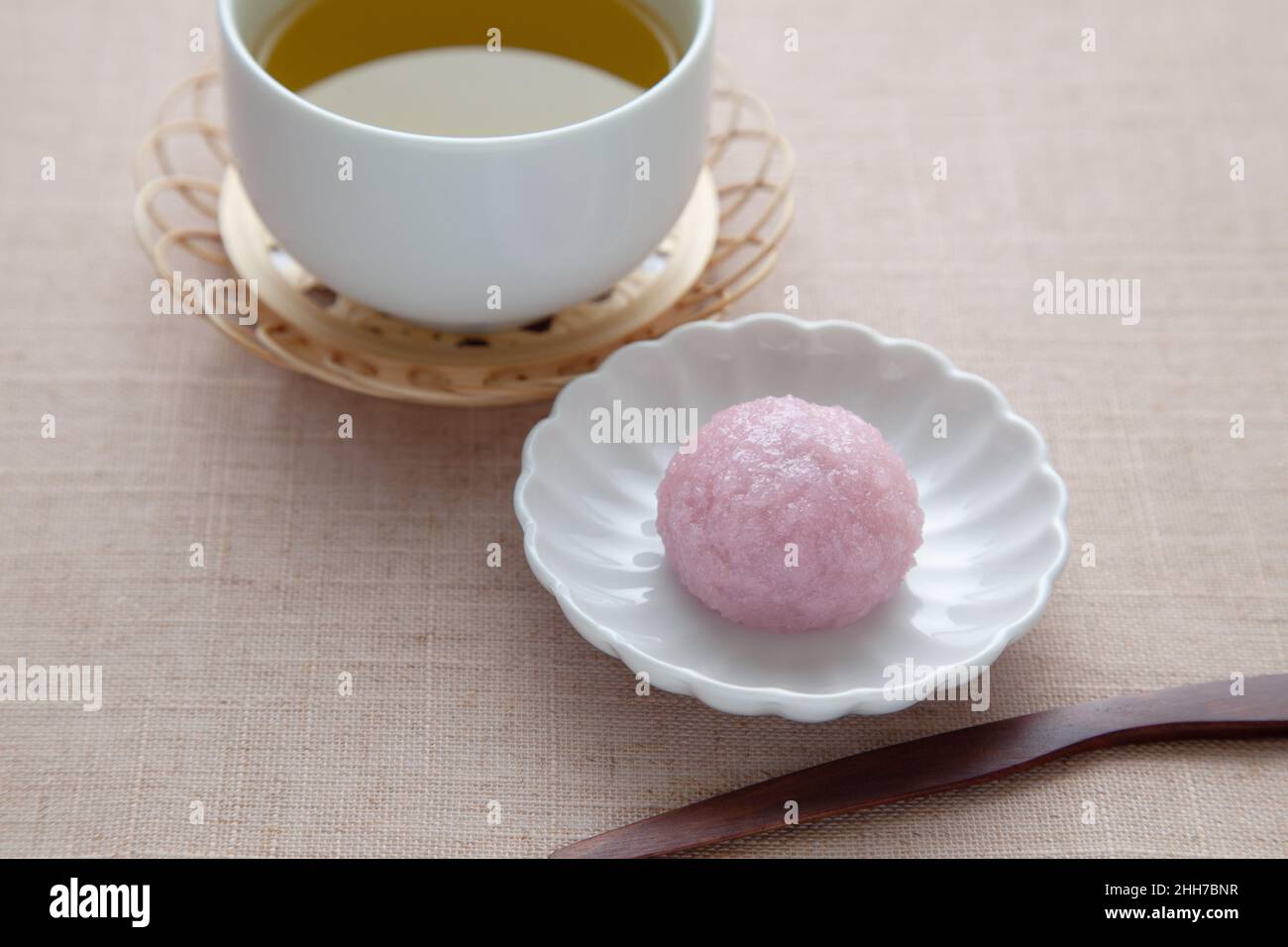 sakura mochi rice cake with hot tea on table cloth Stock Photo - Alamy