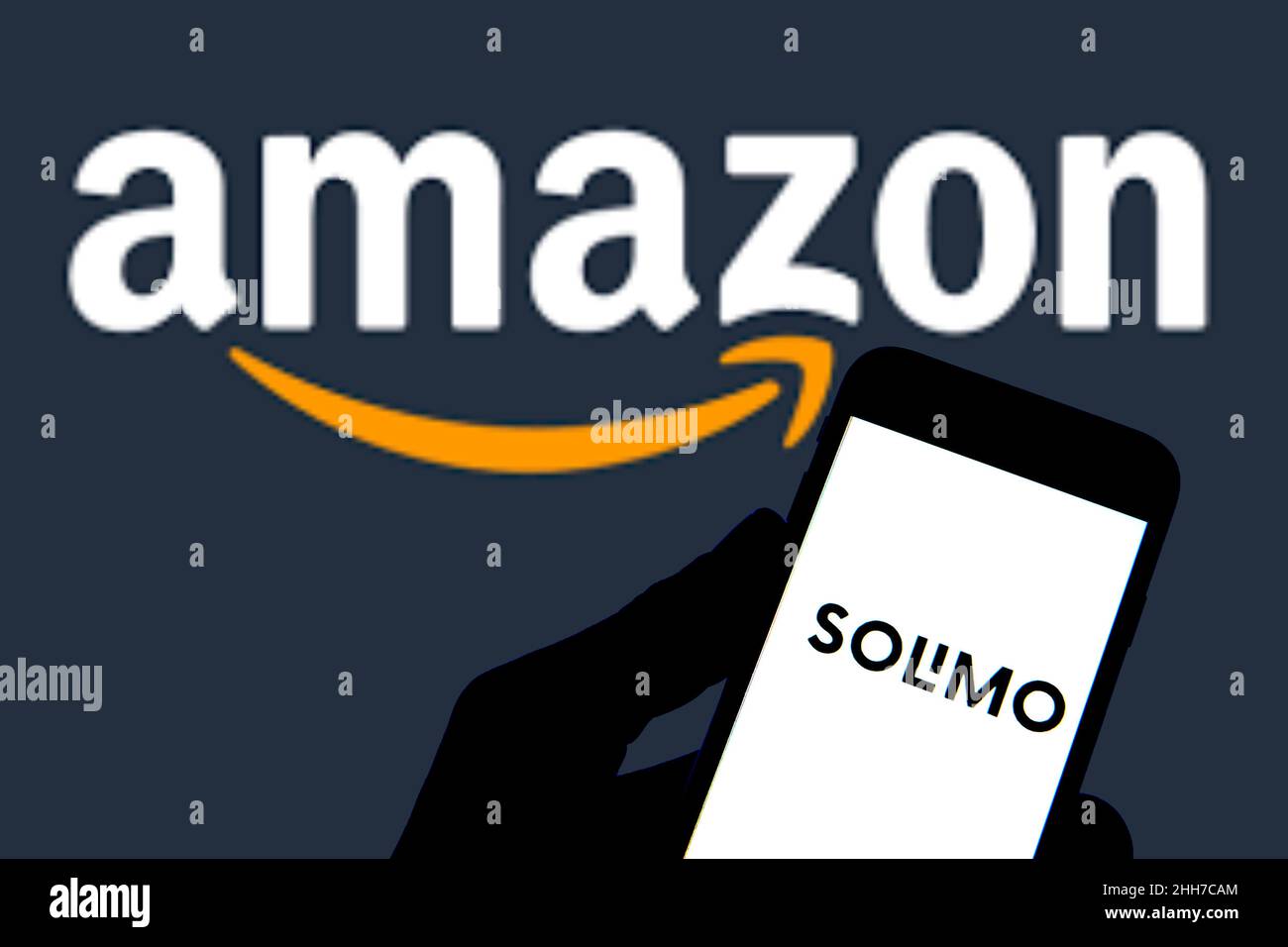 In this photo illustration a Solimo logo seen displayed on a smartphone ...