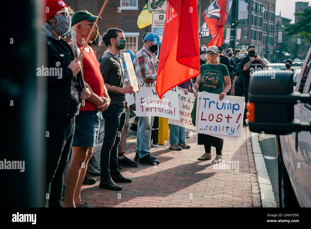 Portland, United States. 19th Sep, 2021. Protesters hold placards and ...