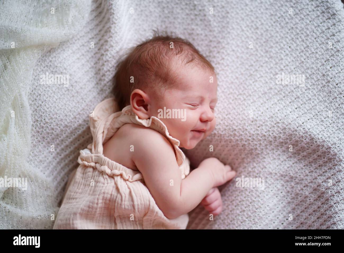 The child smiles in his sleep Stock Photo - Alamy