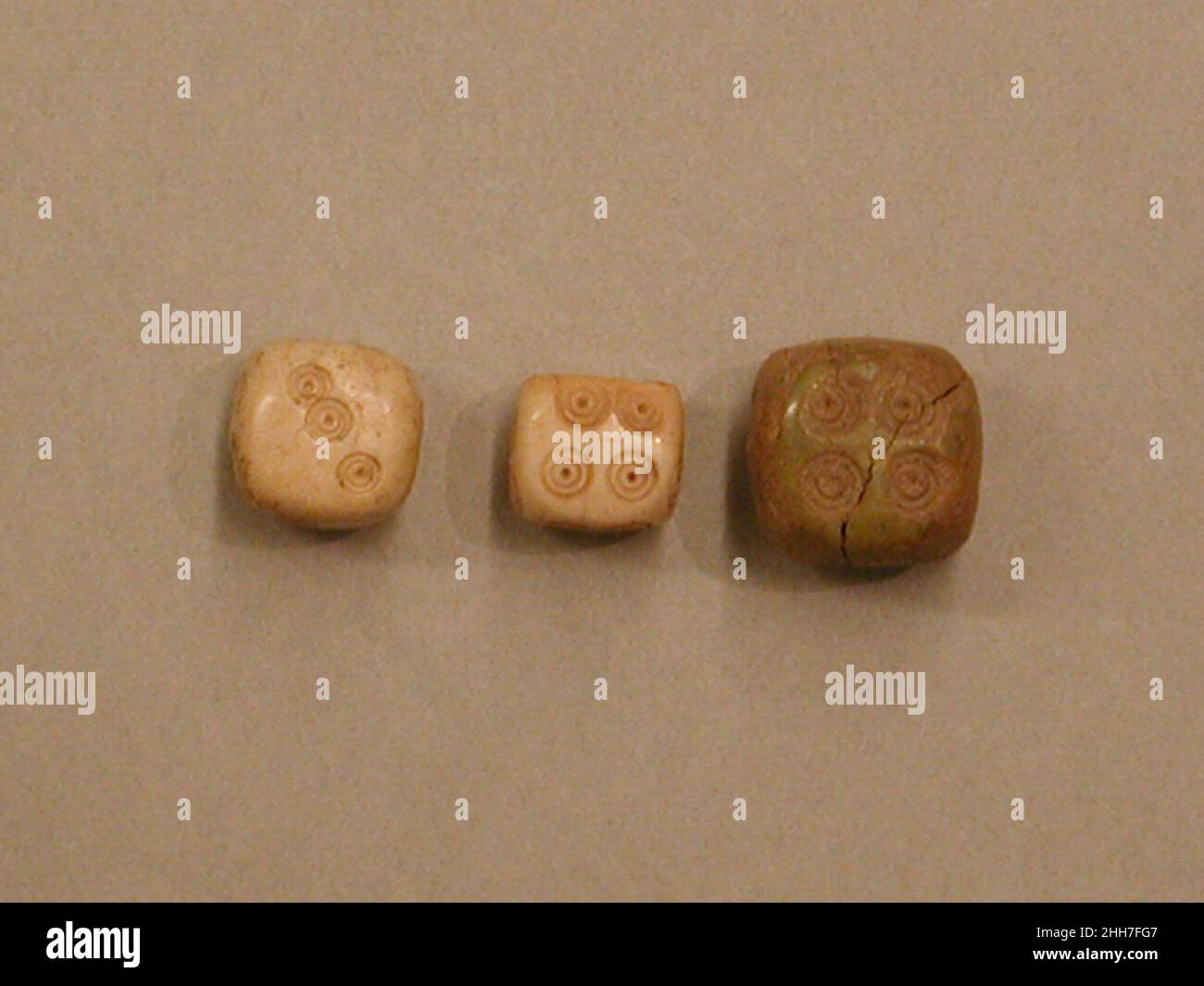 Dice 9th–10th century The dot-in-circle motif recalls designs presumed ...