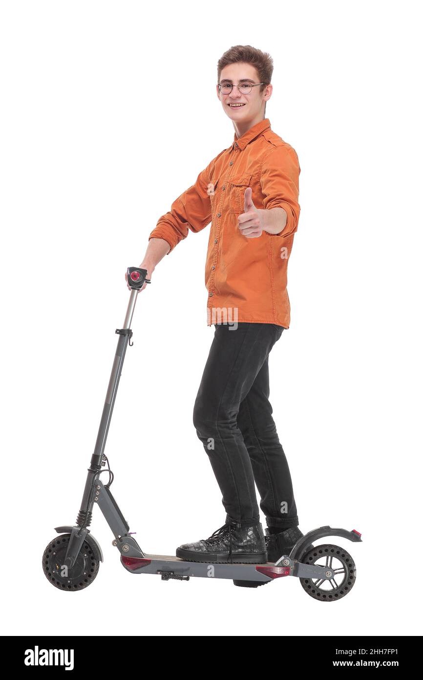 Side view of happy man rides a black kick scooter, isolated on white ...
