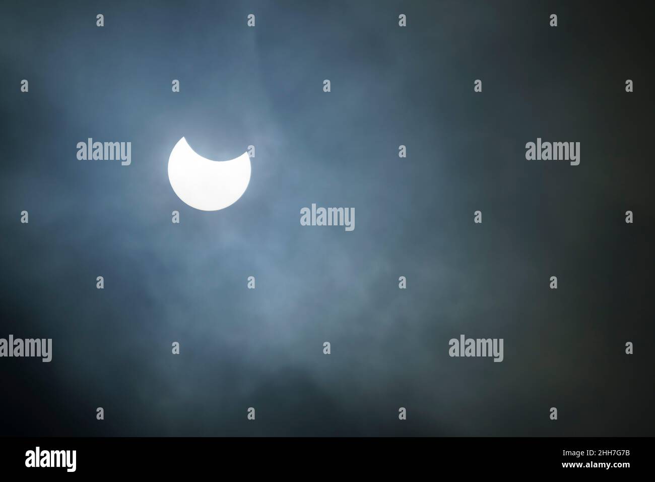 A partial eclipse of the Sun seen from the border of England and ...