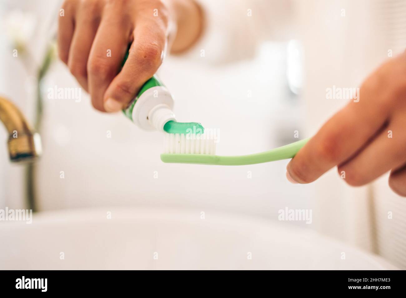 Squeezing toothpaste tube hi-res stock photography and images - Alamy
