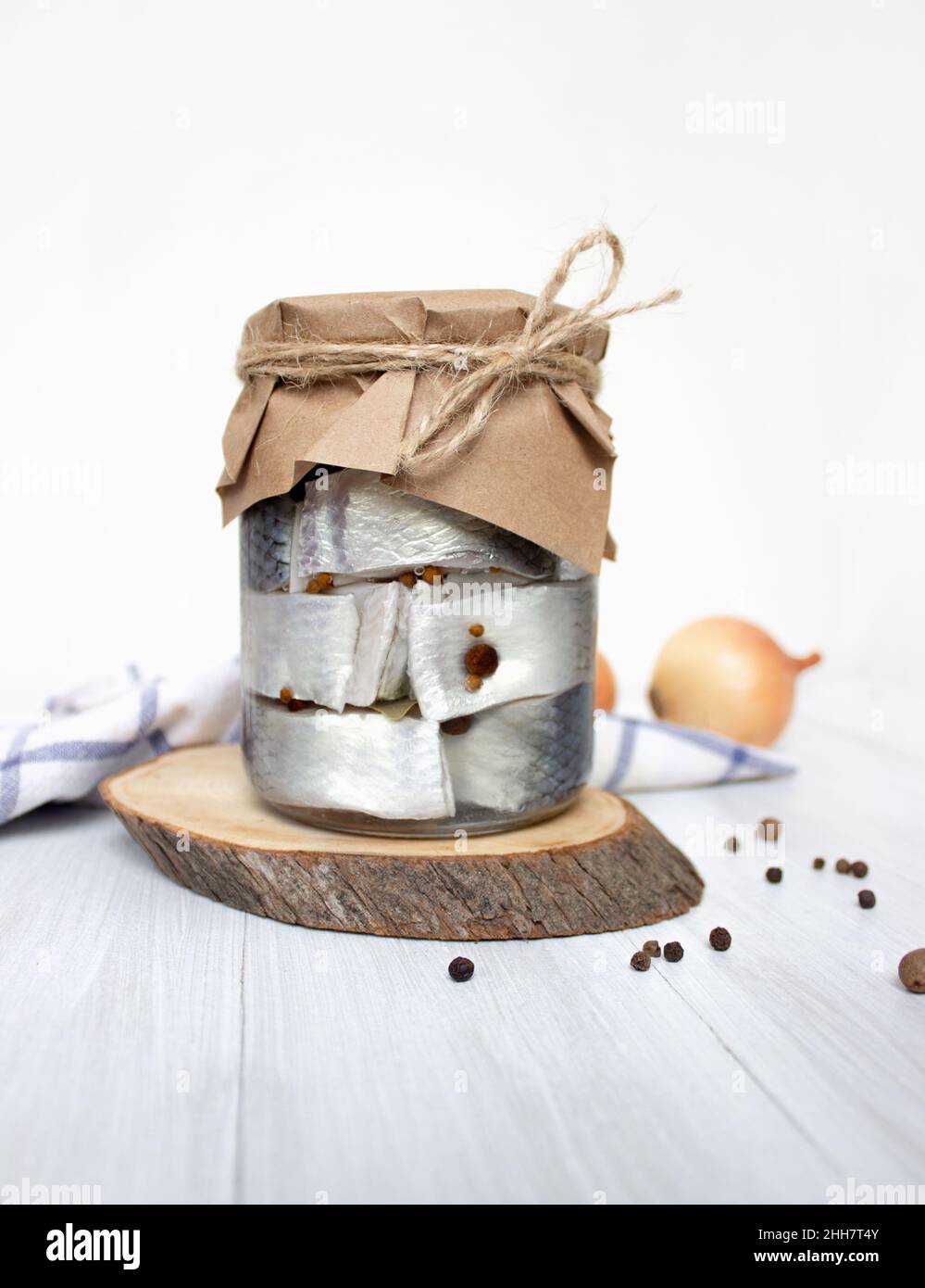 Pickled fish against a background of spices hi-res stock photography ...