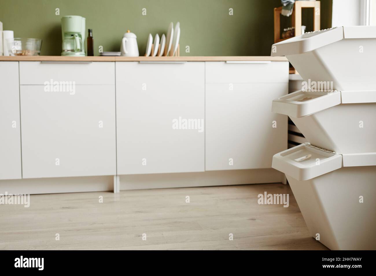 Minimal background image of empty kitchen interior with focus on waste ...