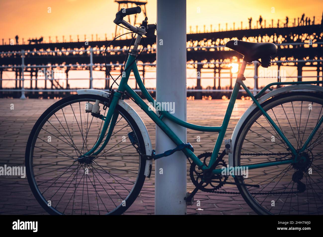 With the background of a sunset on the Rio Tinto dock, a vintage ...